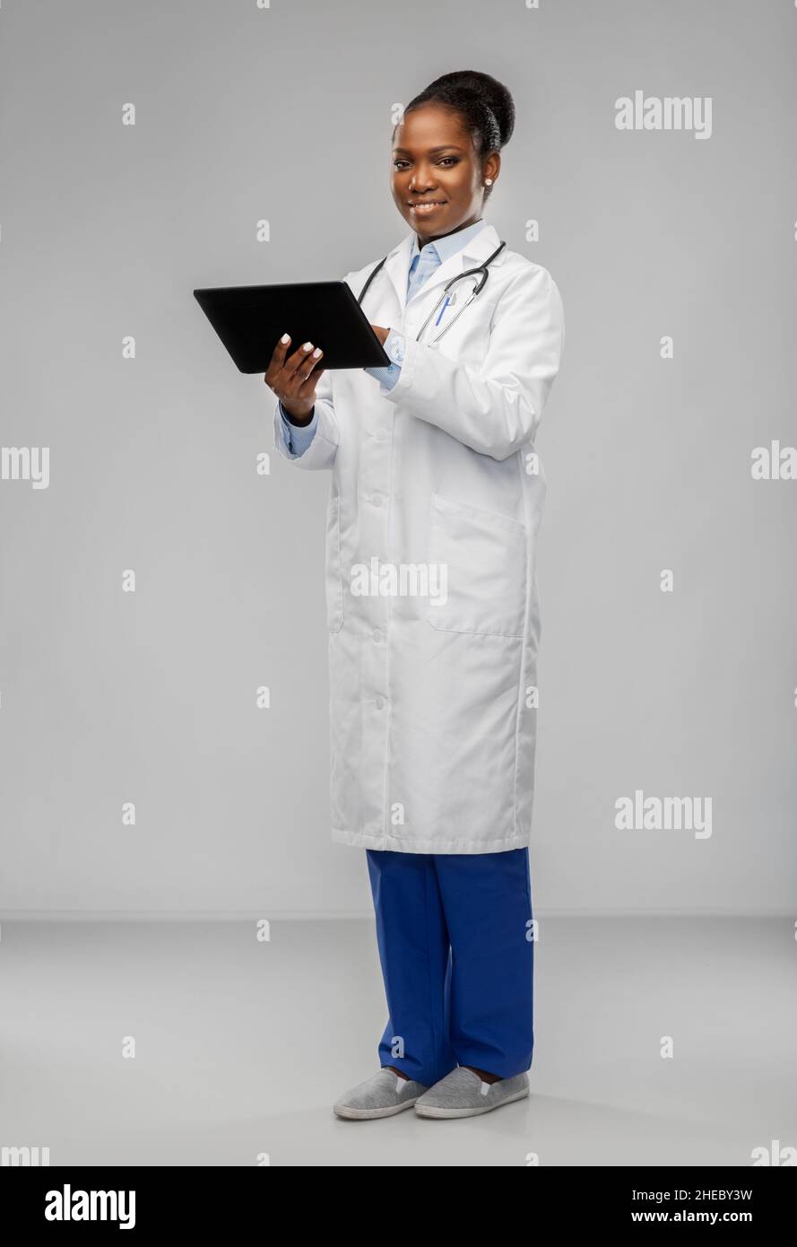 african american female doctor with tablet pc Stock Photo - Alamy