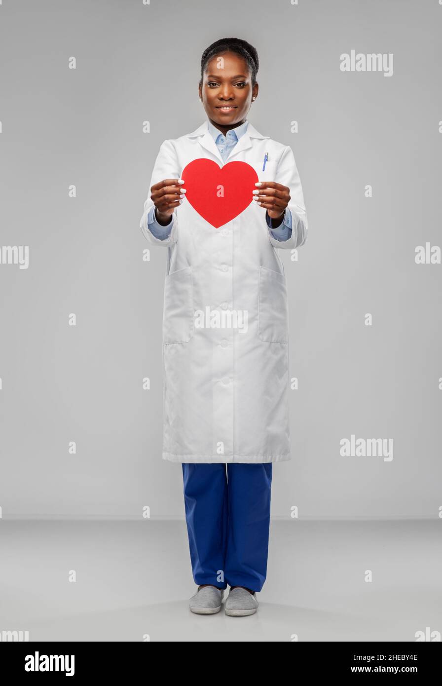 african american female doctor with red heart Stock Photo - Alamy