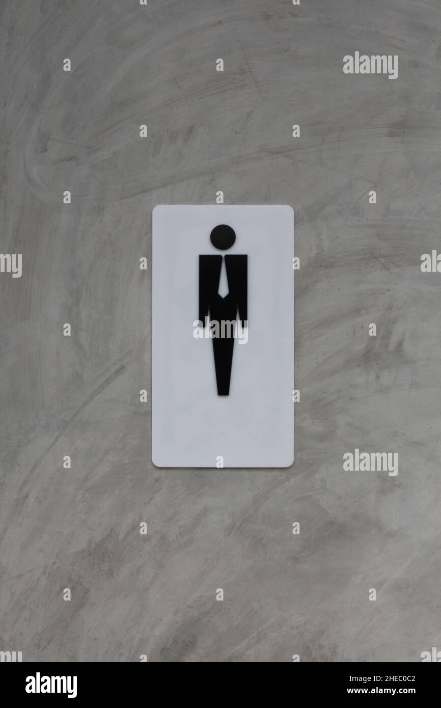 Male restroom sign on grey vintage cement wall background for design in ...