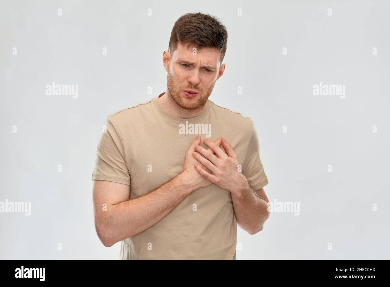 Man suffering heart attack hi-res stock photography and images - Alamy