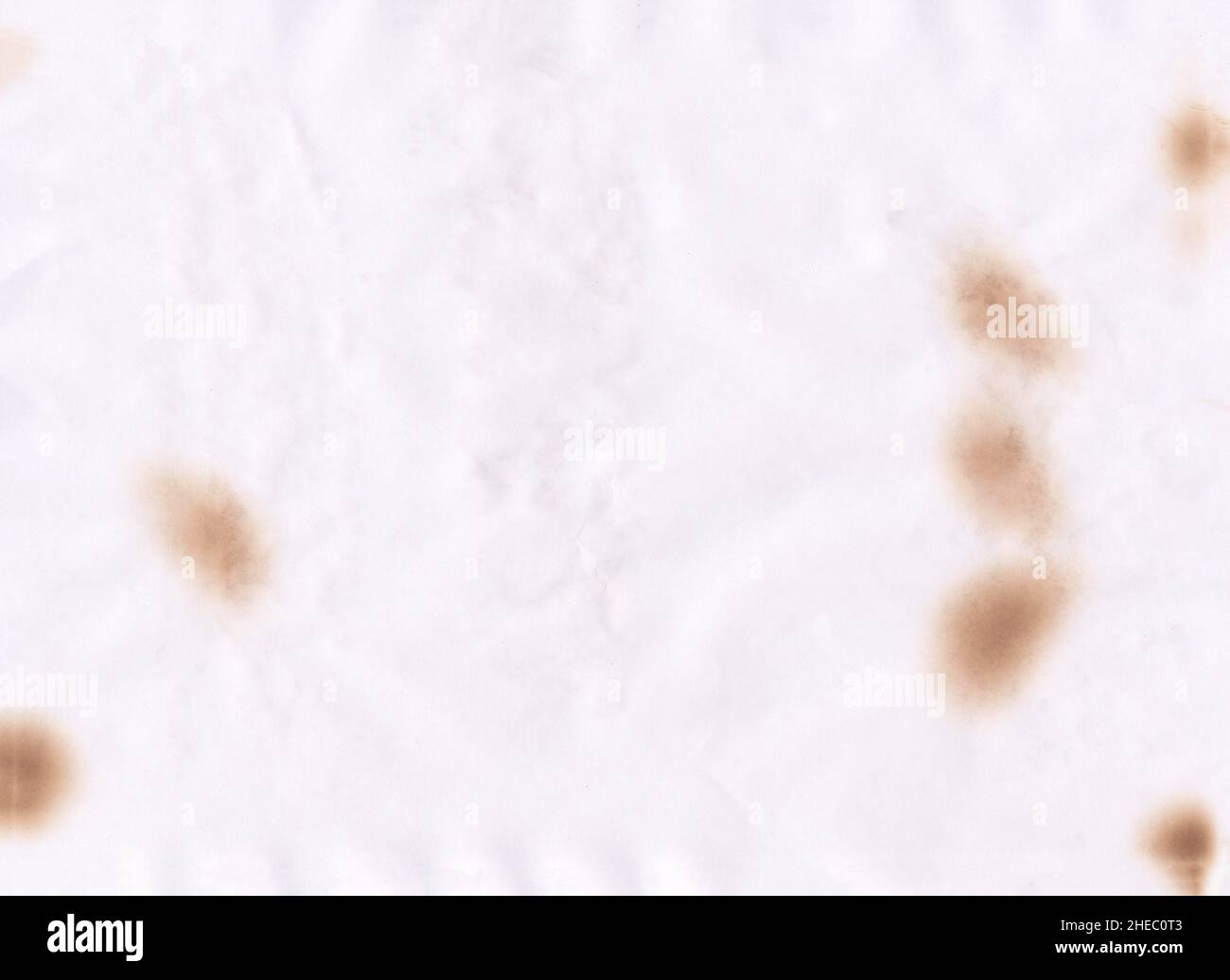 Vintage colored of old paper background with thermal burn marks for ...