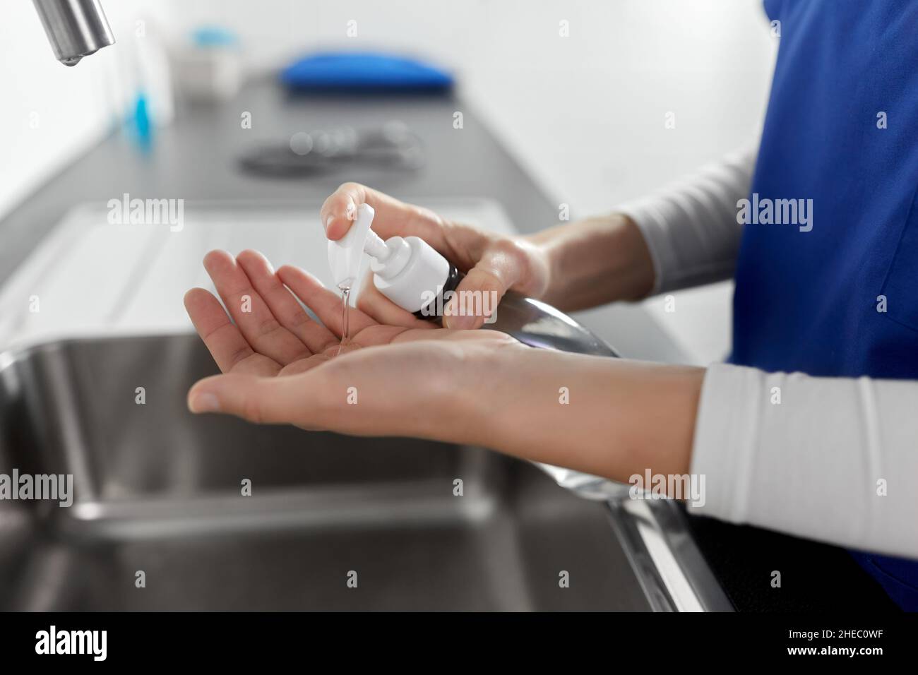 doctor or nurse washing hands with liquid soap Stock Photo - Alamy