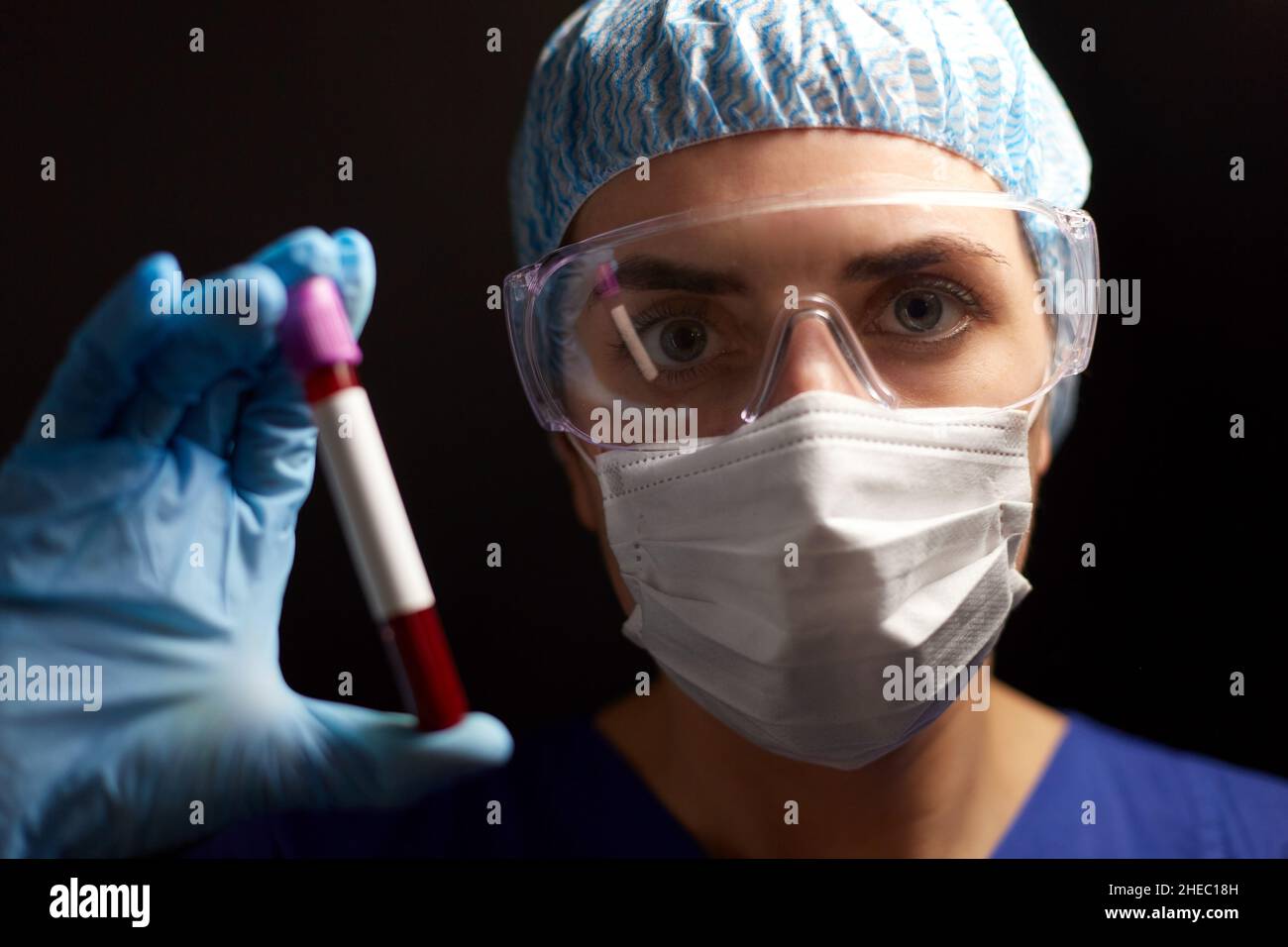 Doctor holding beaker blood hi-res stock photography and images - Alamy