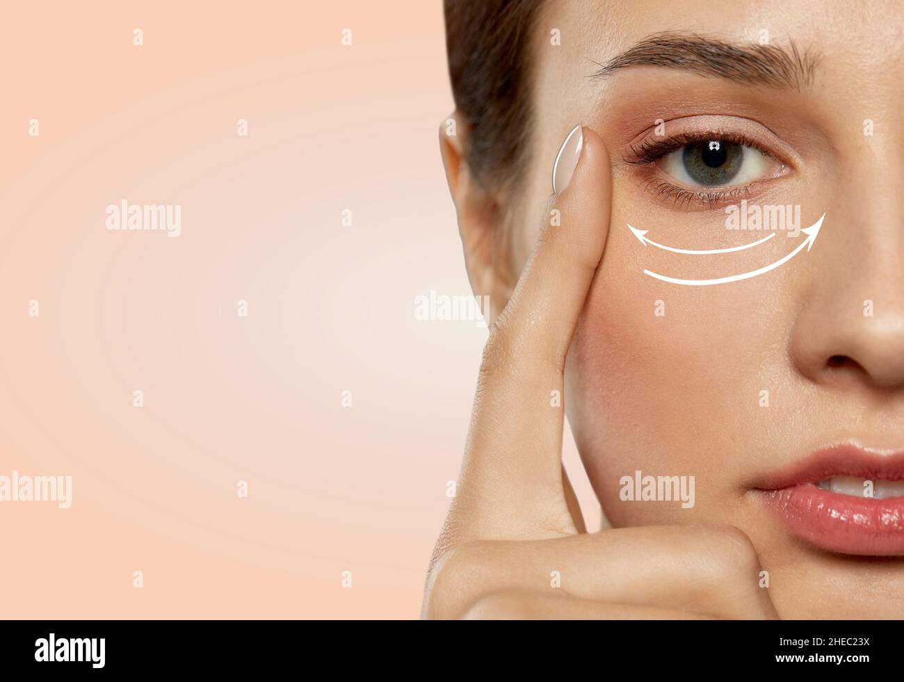 close up of young woman face with arrows under eye Stock Photo - Alamy