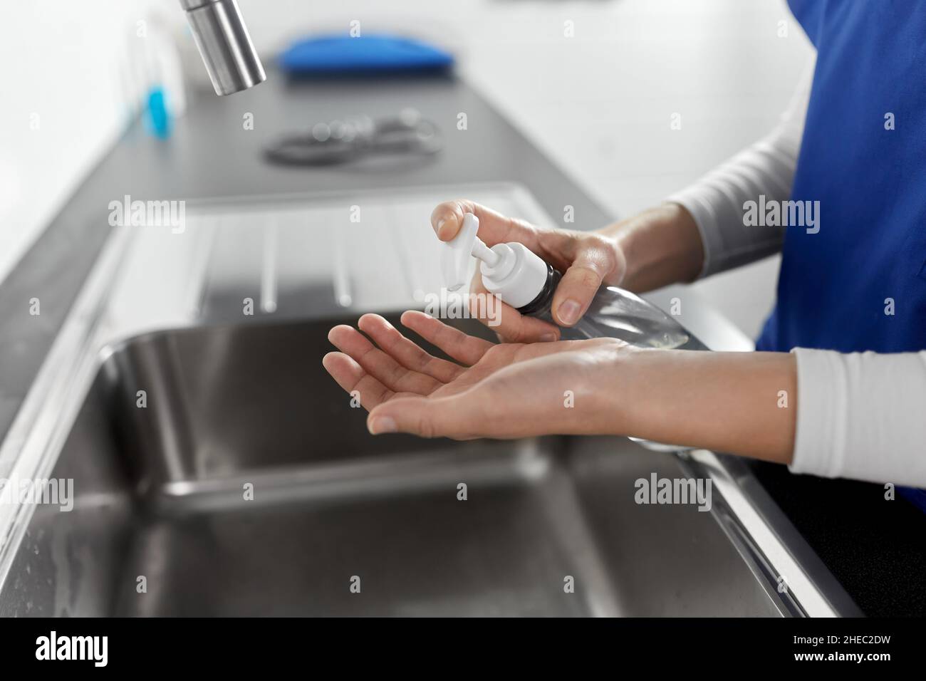 doctor or nurse washing hands with liquid soap Stock Photo - Alamy