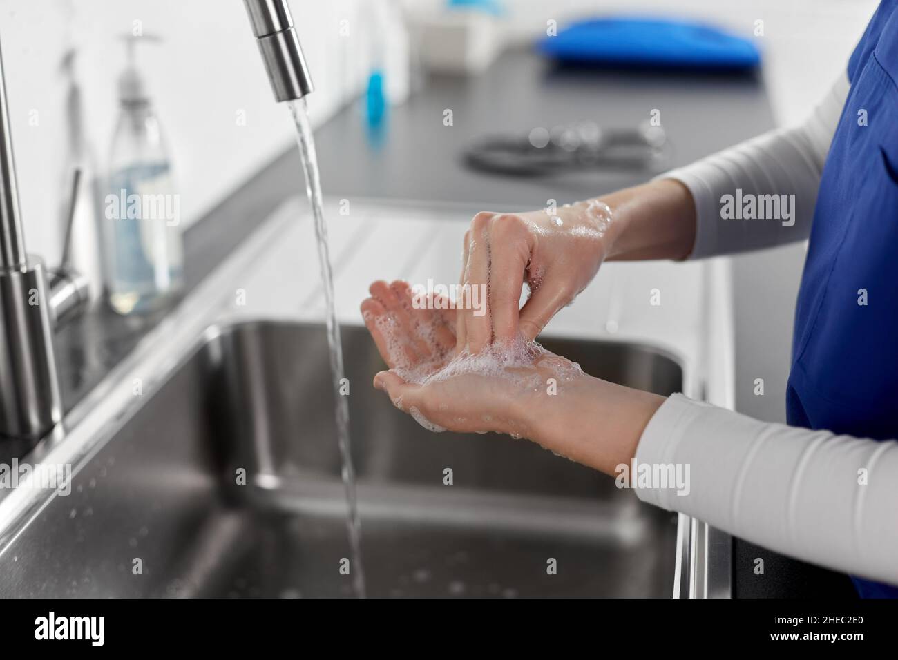 doctor or nurse washing hands with liquid soap Stock Photo - Alamy