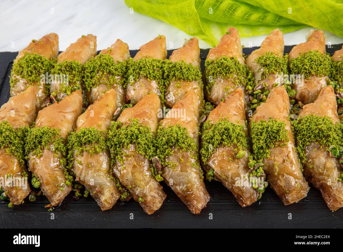 Sobiyet baklava on a marble background. Turkish patisserie dessert with ...