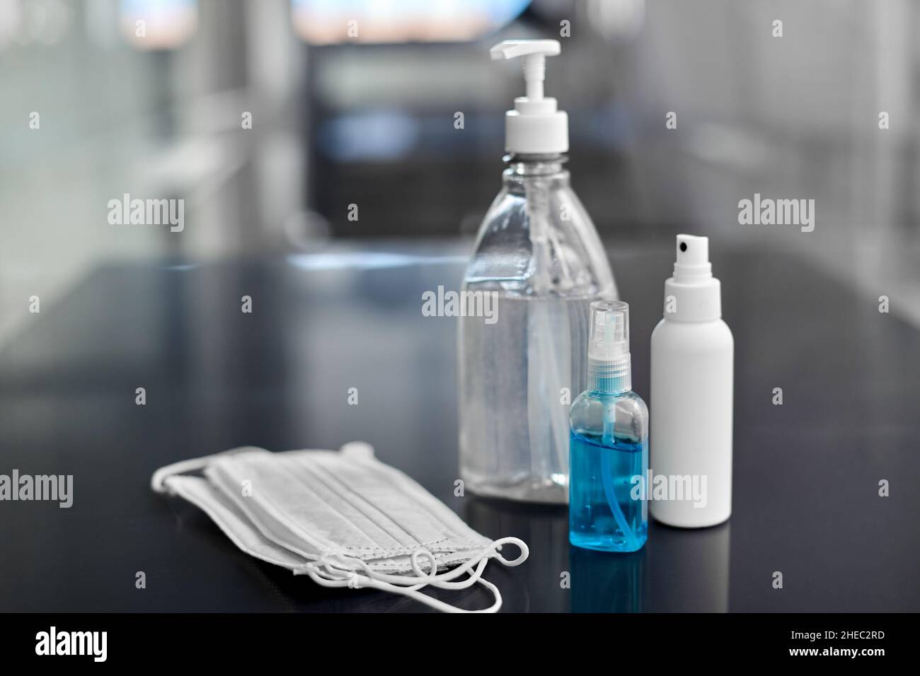 Hand sanitizers masks hi-res stock photography and images - Alamy