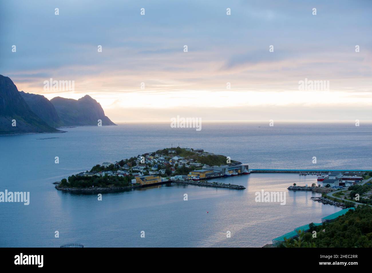 Aerial view of Husoy, little village on a tiny island belonging to the ...