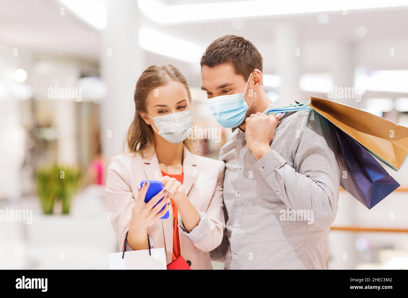 Man woman shopping face mask masks hi-res stock photography and images ...