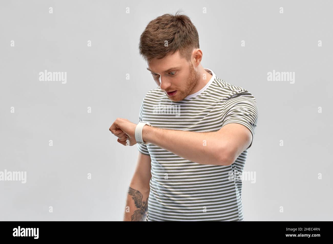 Hand looking at watch hi-res stock photography and images - Alamy