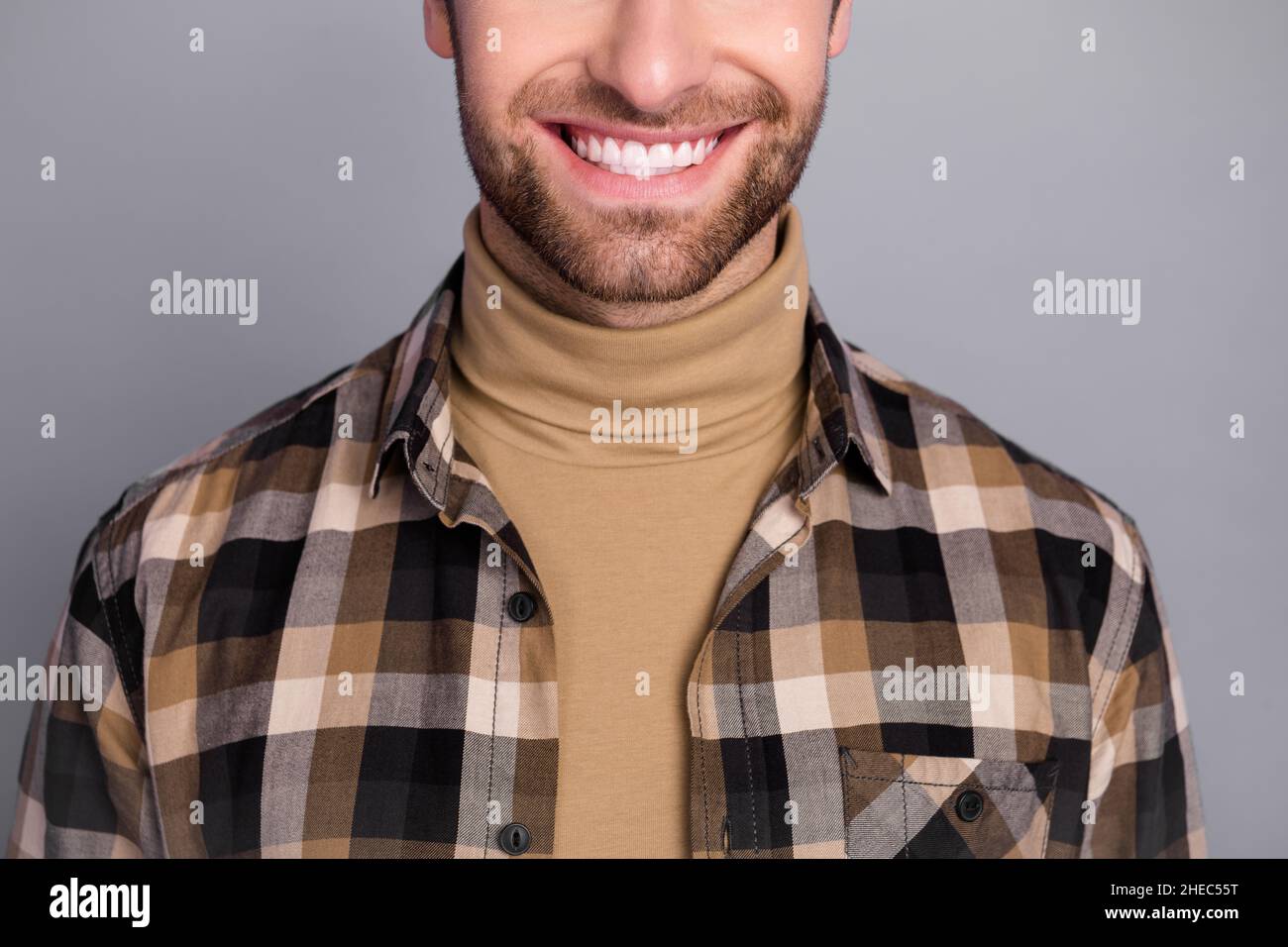 Photo of cheerful positive guy dressed checkered shirt smiling cheeks ...