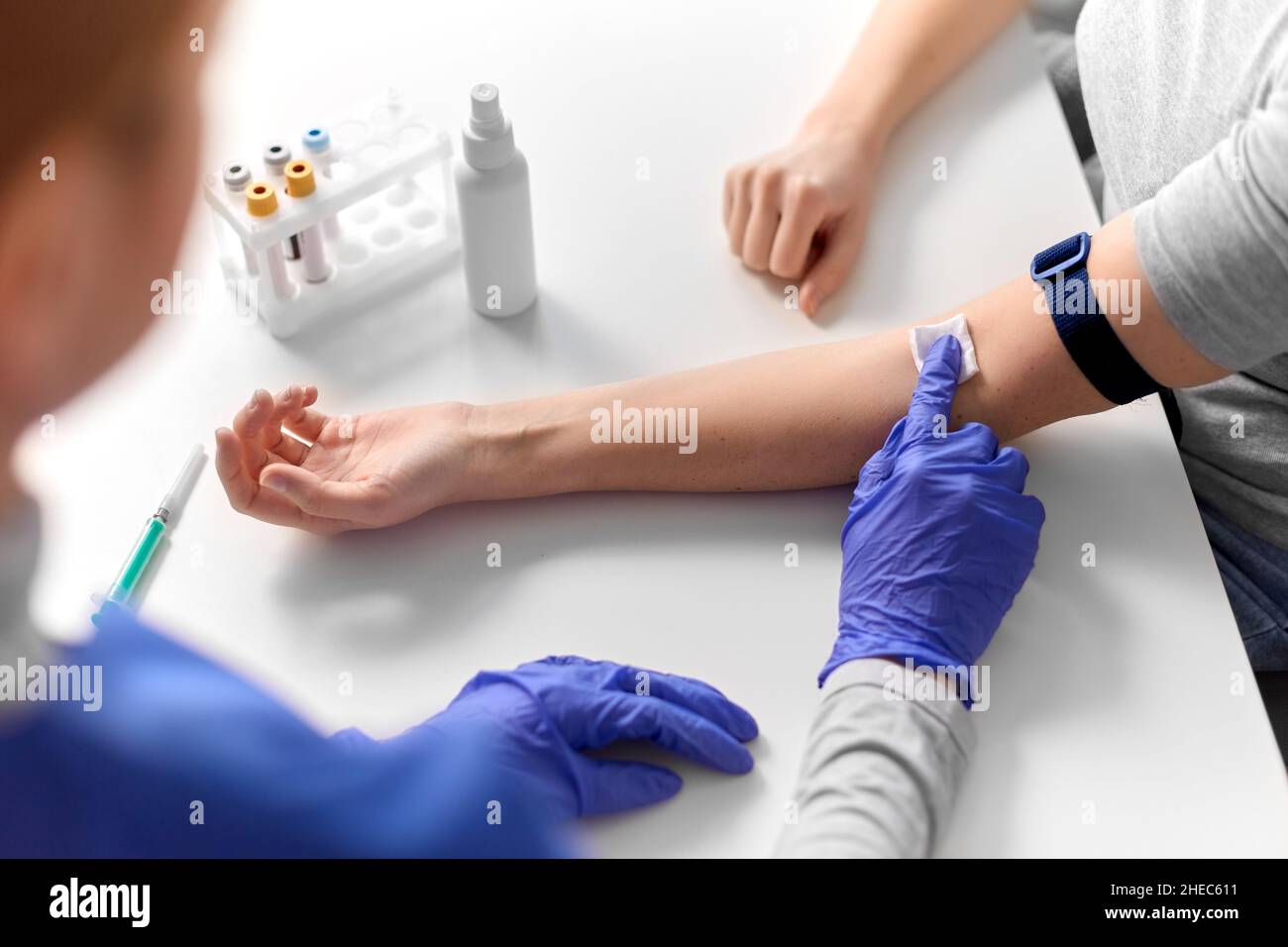 doctor and patient taking blood for test Stock Photo - Alamy