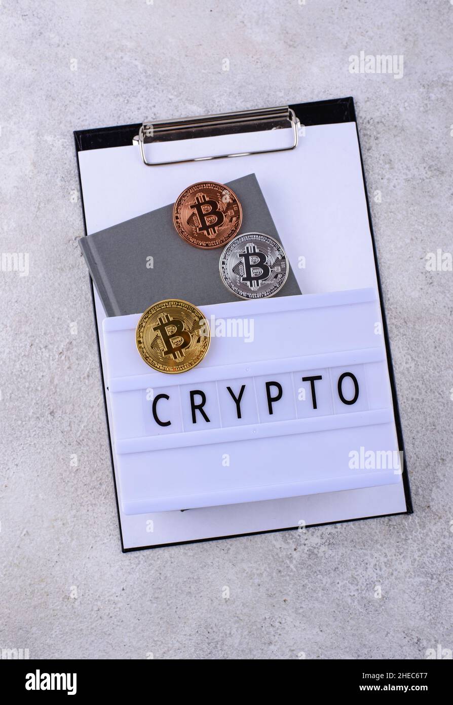 Bitcoin coins on office desk. Cryptocurrency concept Stock Photo - Alamy