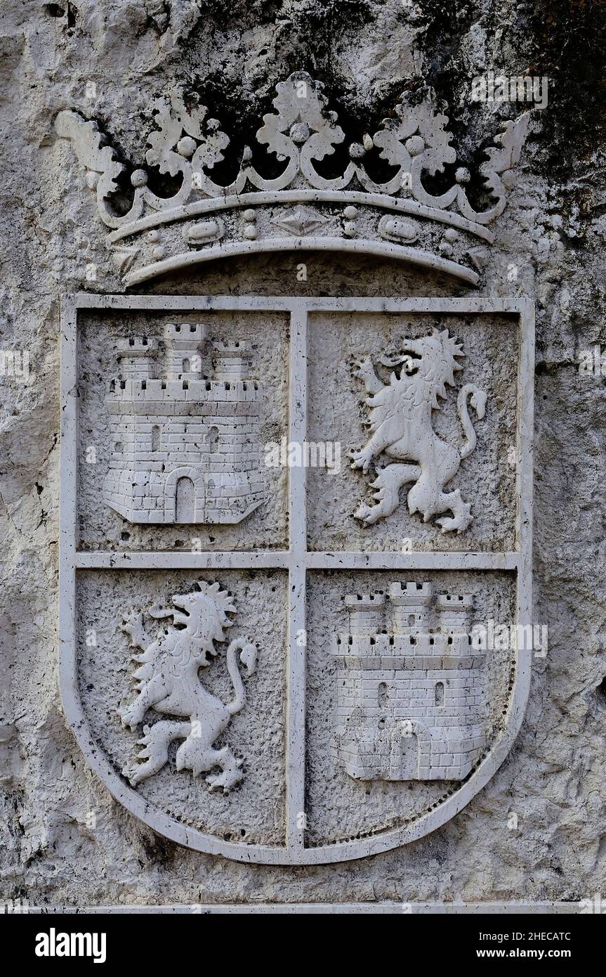 Stone heraldic coat of arms on a wall in Cuellar, Segovia Stock Photo ...