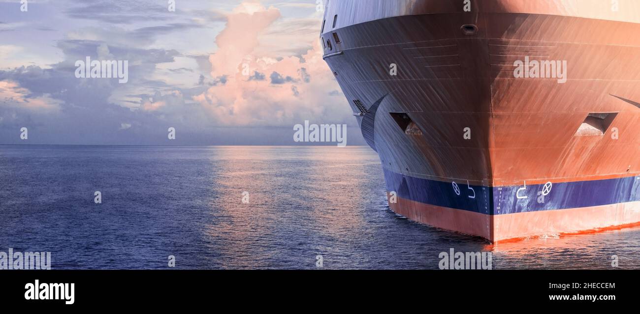Close up of large merchant cargo ship in the middle of the ocean ...