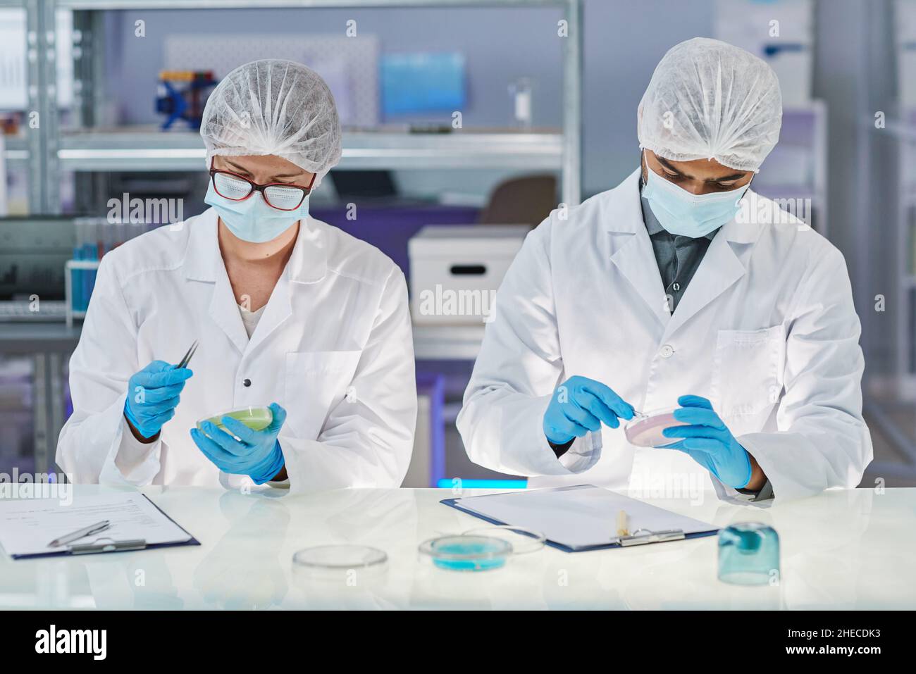 Scientist mixing chemicals hi-res stock photography and images - Alamy