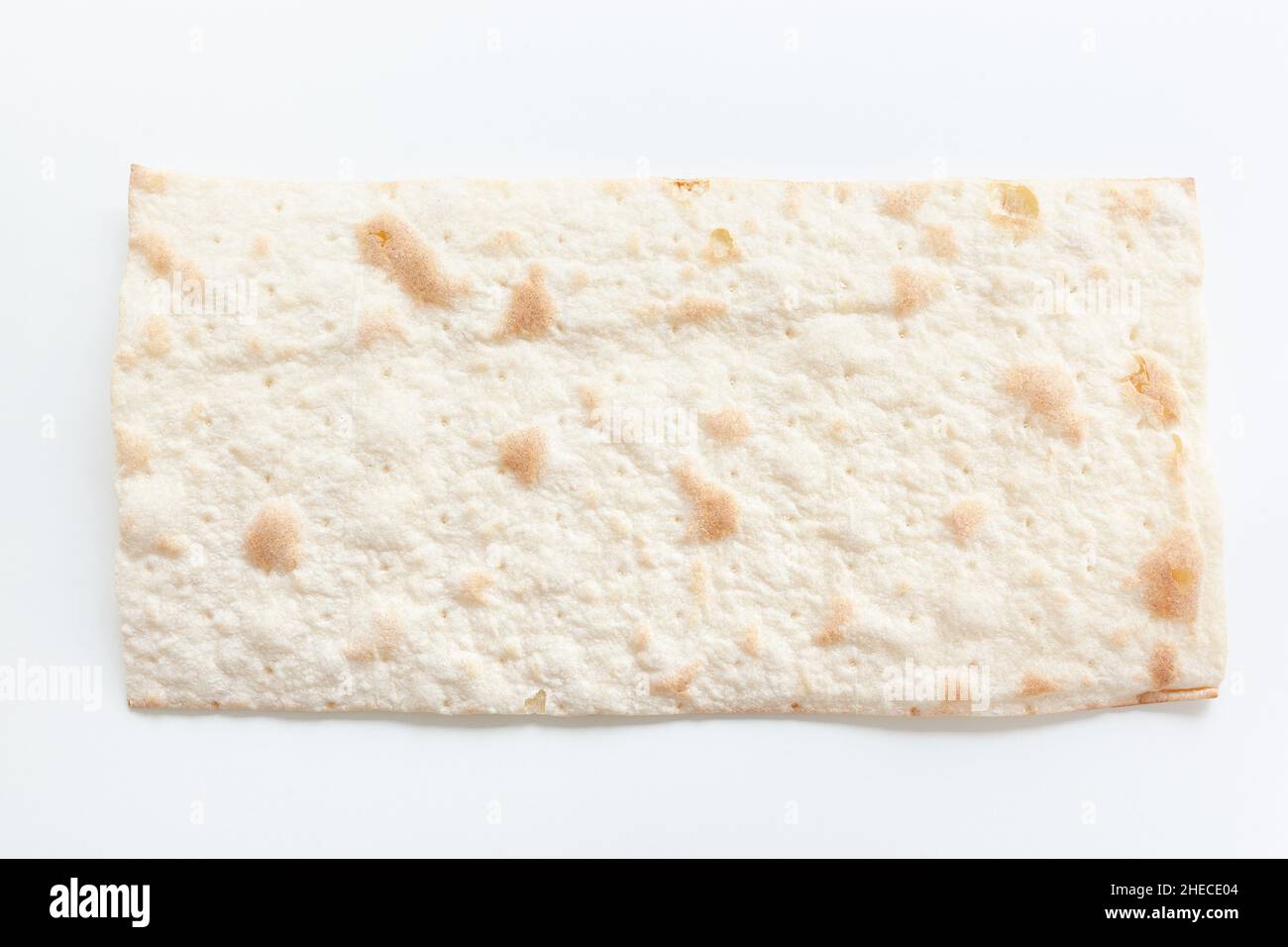 Dry flat bread, toasted, laying flat on white background, Croatian ...