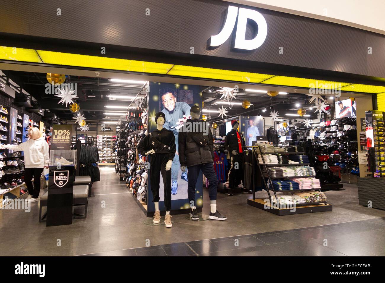 JD Sports shop with open walk in display and sign for the airside ...