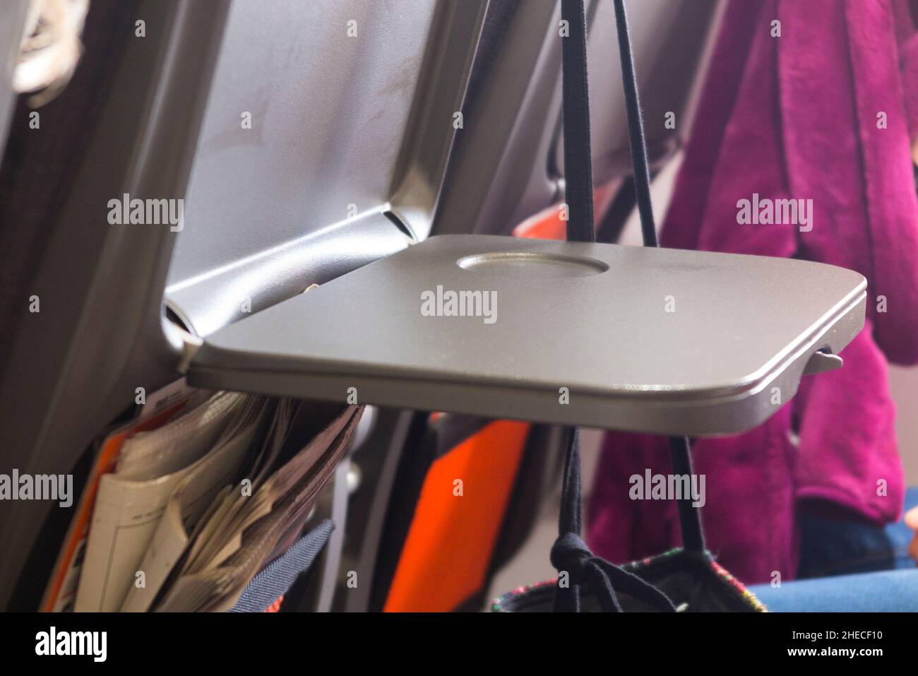 Passenger seat tray table in the full down position ready for use, on ...
