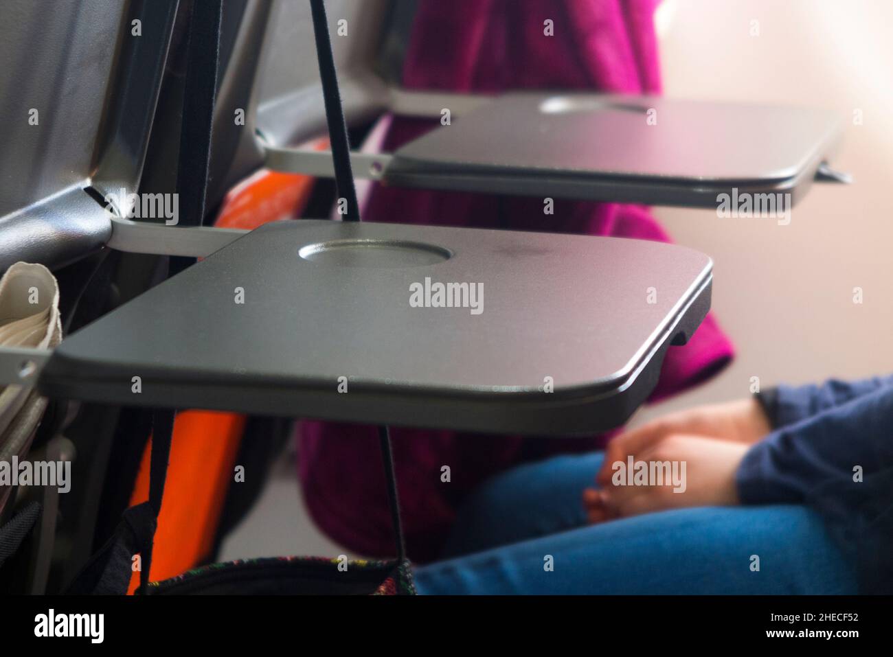 Passenger seat tray table in the full down position ready for use, on ...