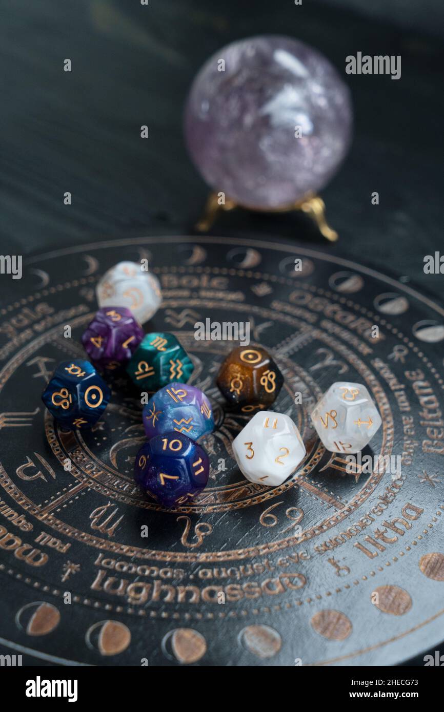 Zodiac horoscope with divination dice Stock Photo - Alamy