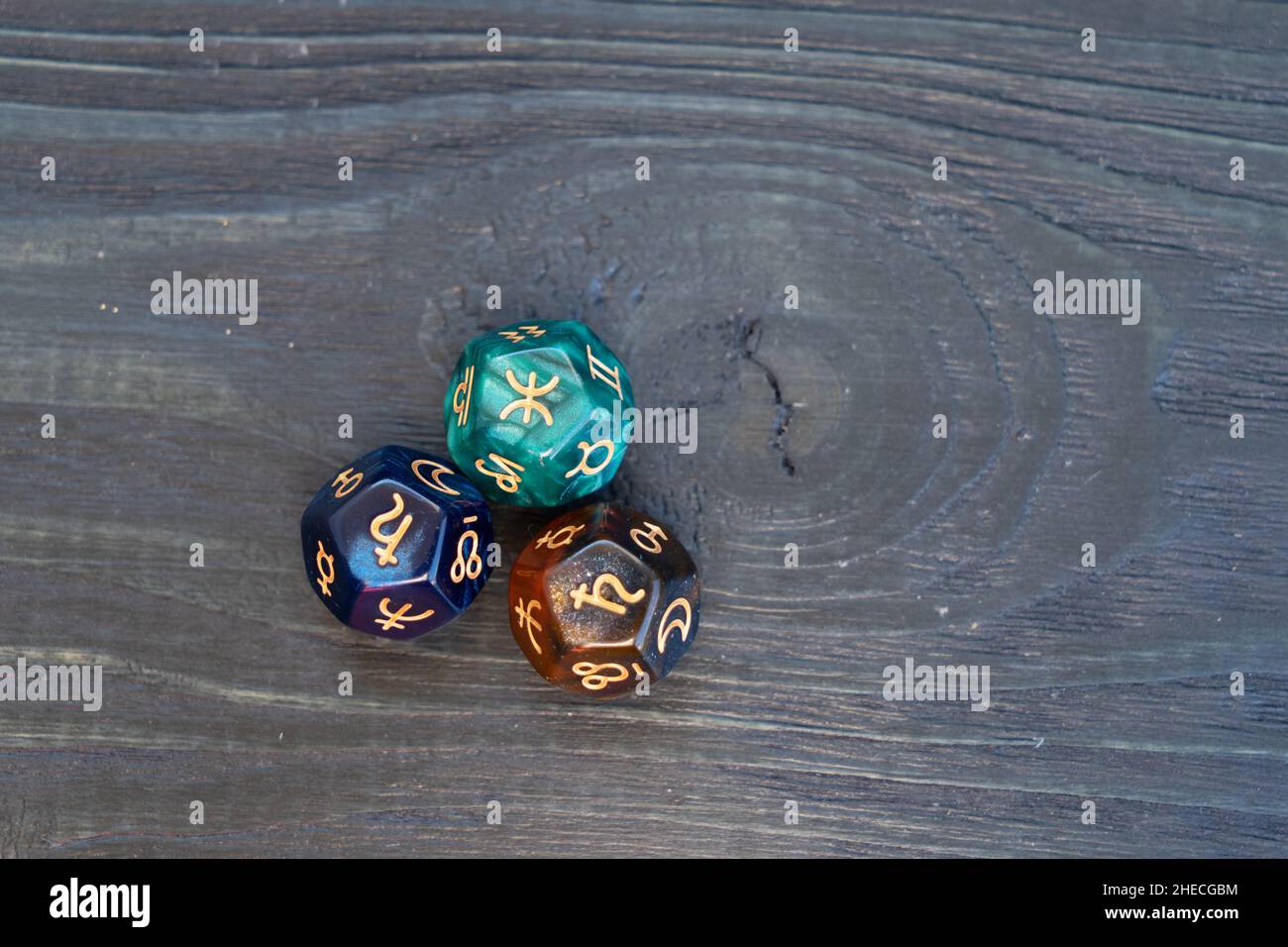Zodiac horoscope with divination dice Stock Photo - Alamy