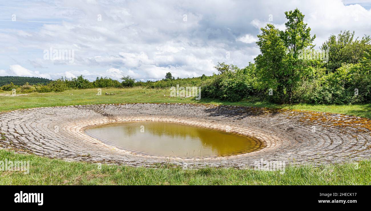 France, Aveyron, Viala du Pas de Jau, lavogne on Larzac plateau Stock ...