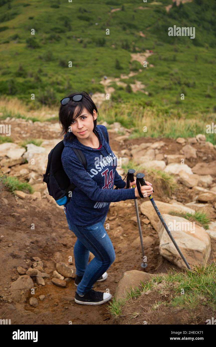Girl Descend Down a Large Green Mountain Range Stock Photo - Alamy