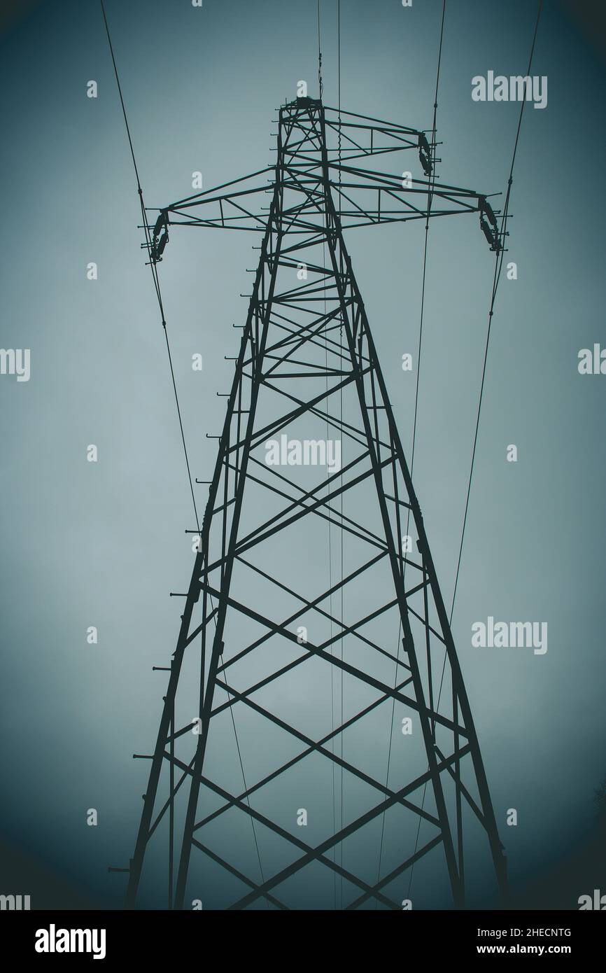 High-voltage power transmission line pylon with power cables Stock ...