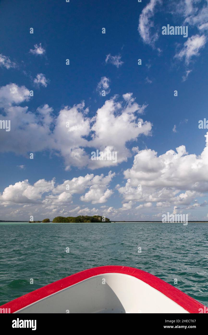 Mexico, Quintana Roo, Bacalar, boat sailing on the 7 colors lagoon ...
