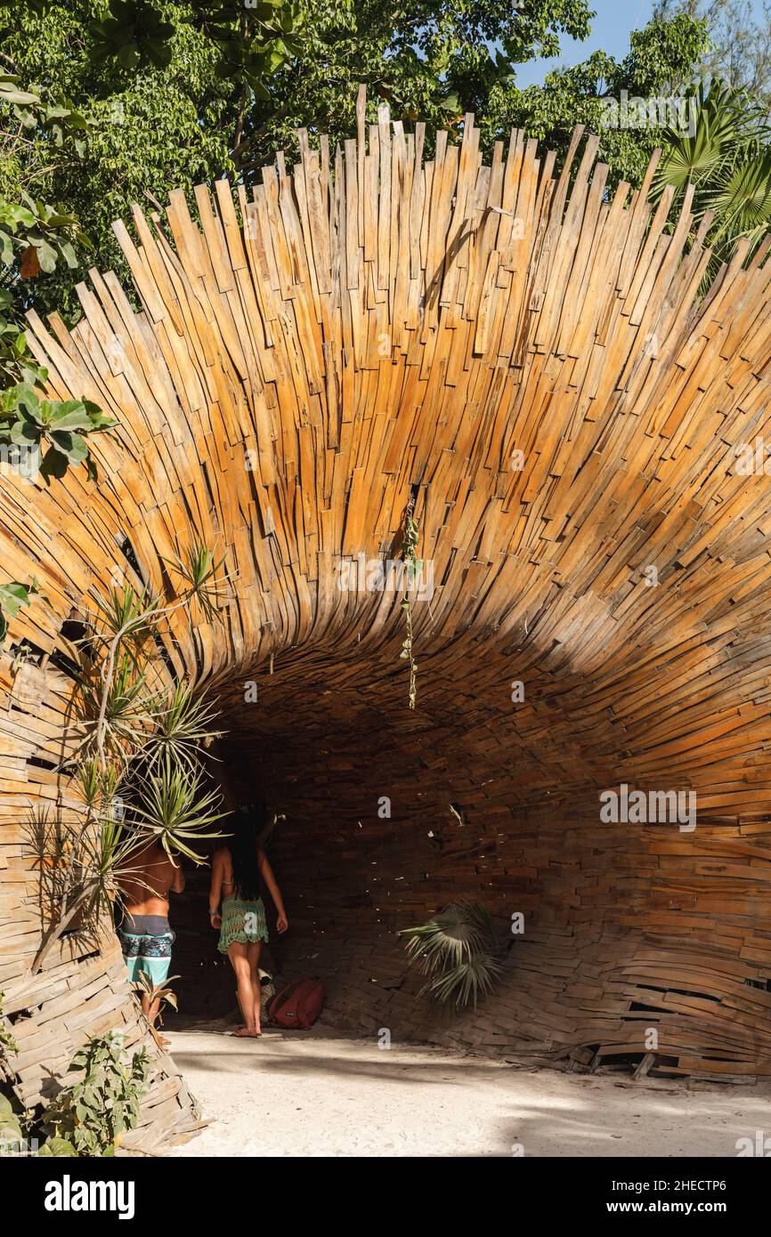 Mexico, Quintana Roo, Tulum, wooden sculpture at the entrance of a ...