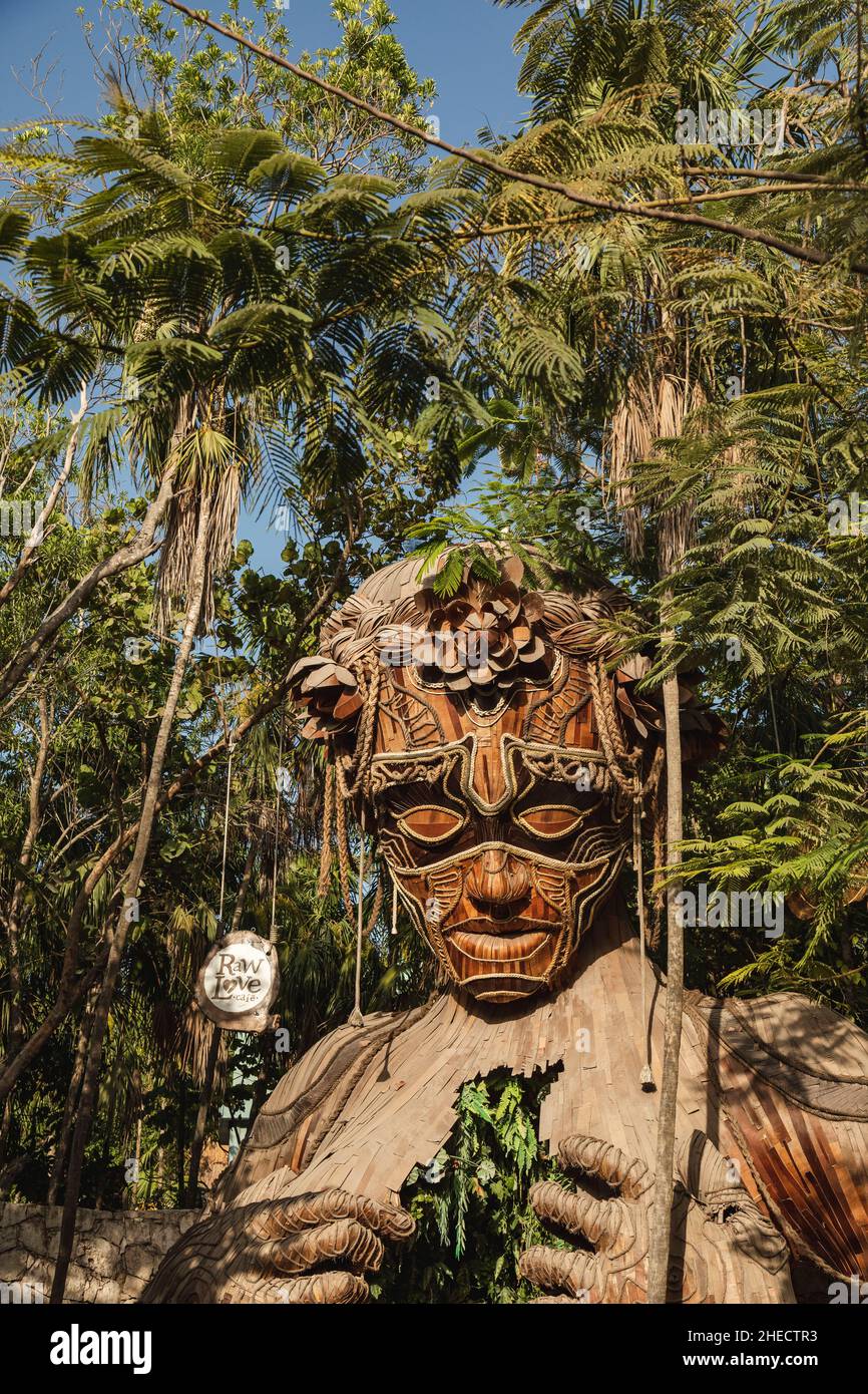 Mexico, Quintana Roo, Tulum, wooden sculpture at the entrance of the ...