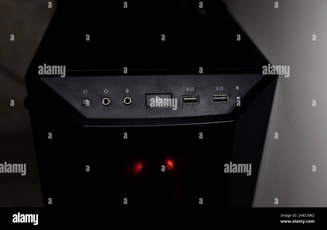 glowing power button on computer system Stock Photo - Alamy