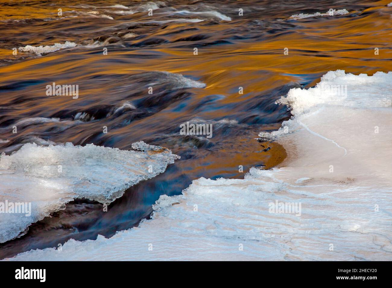 Ice and late afternoon reflections on Tobyhanna Creek in Pennsylvania's ...