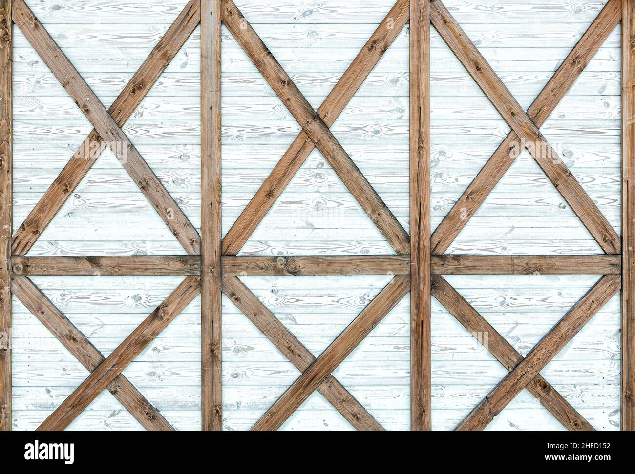 Wooden wall with boards nailed cross-to-cross Stock Photo - Alamy