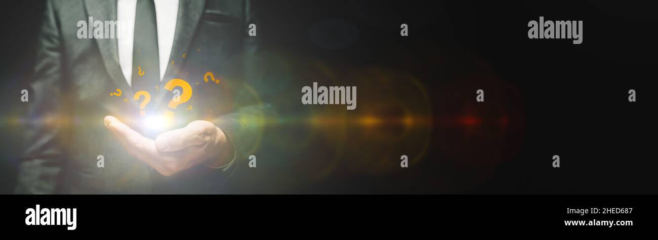 Important business questions, businessman with question marks ...