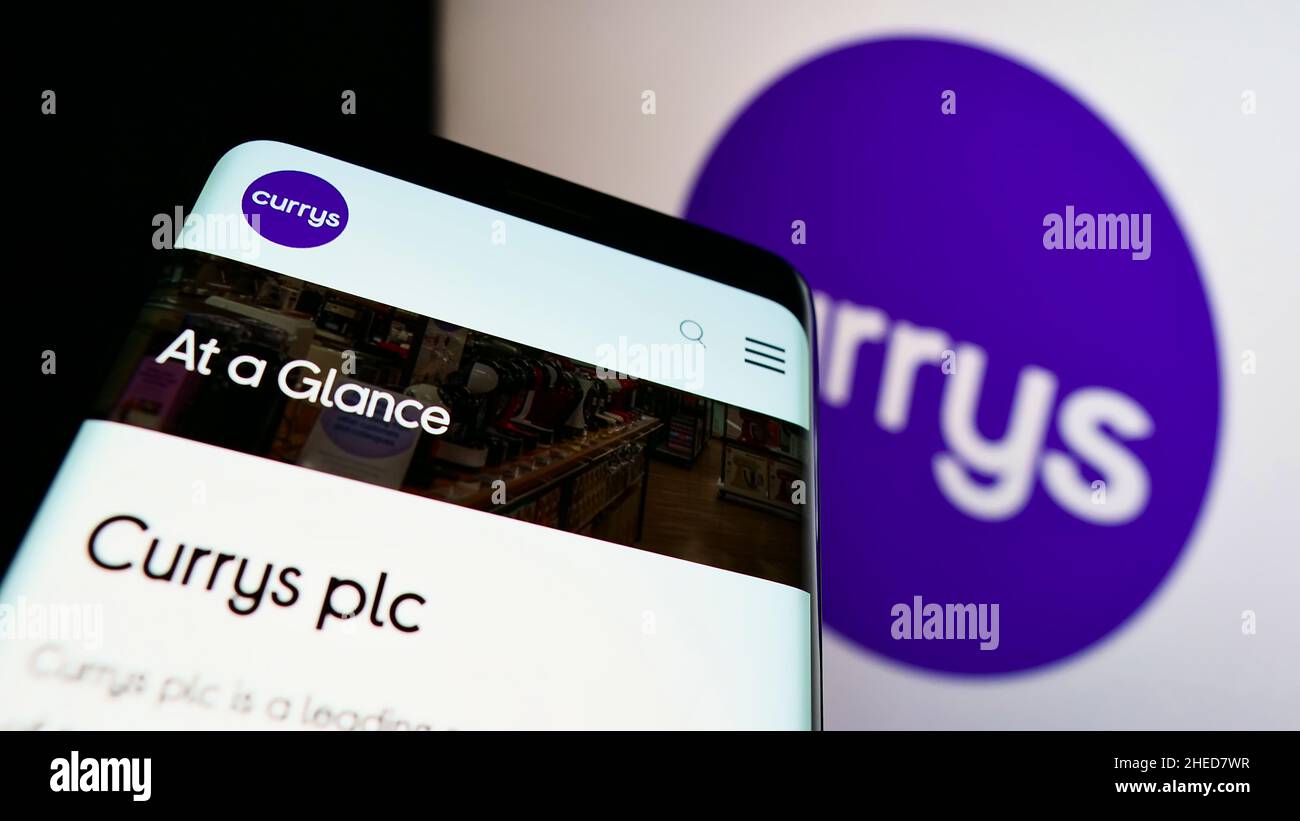 Mobile phone with website of British electronics retail company Currys ...