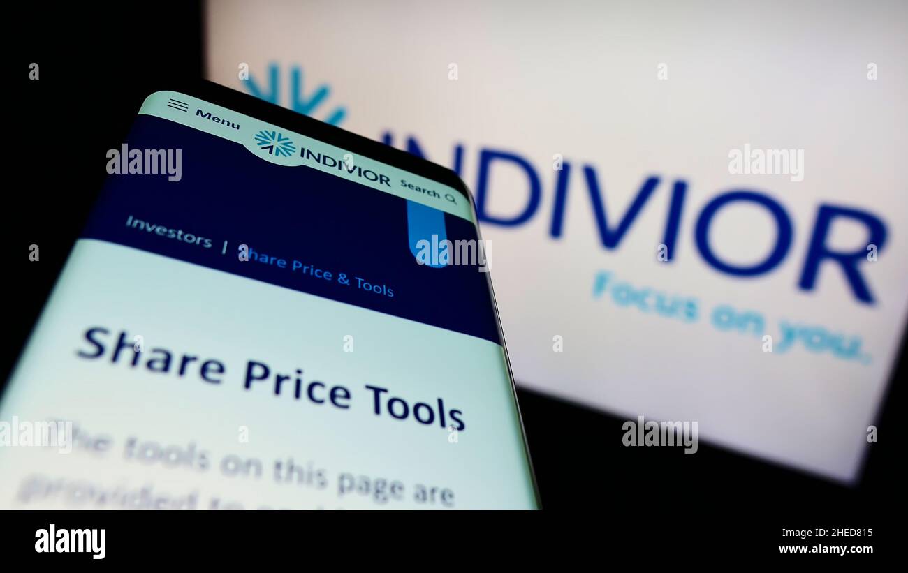 Smartphone with webpage of British pharmaceutical company Indivior plc ...