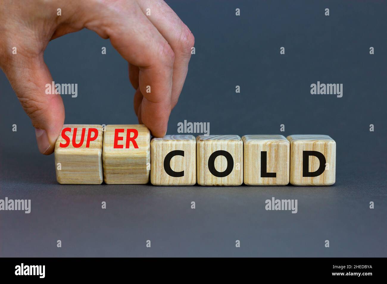 Super cold symbol. Doctor turns wooden cubes and changes concept words ...