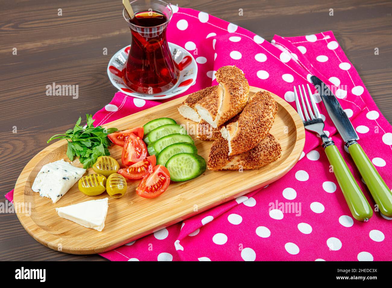 Turkish breakfast with simit, cheese, cherry tomato, cucumber, black ...