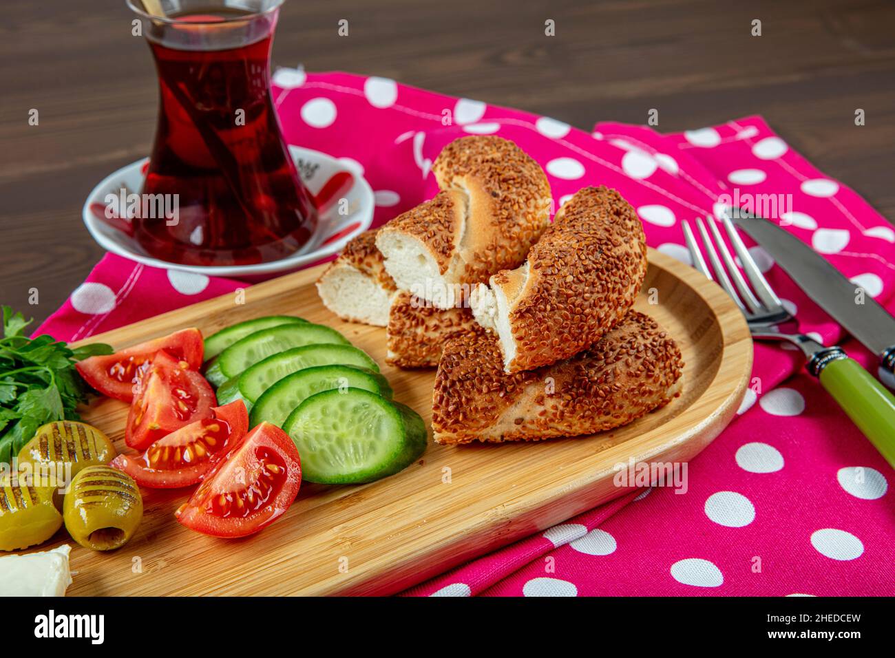 Turkish breakfast with simit, cheese, cherry tomato, cucumber, black ...