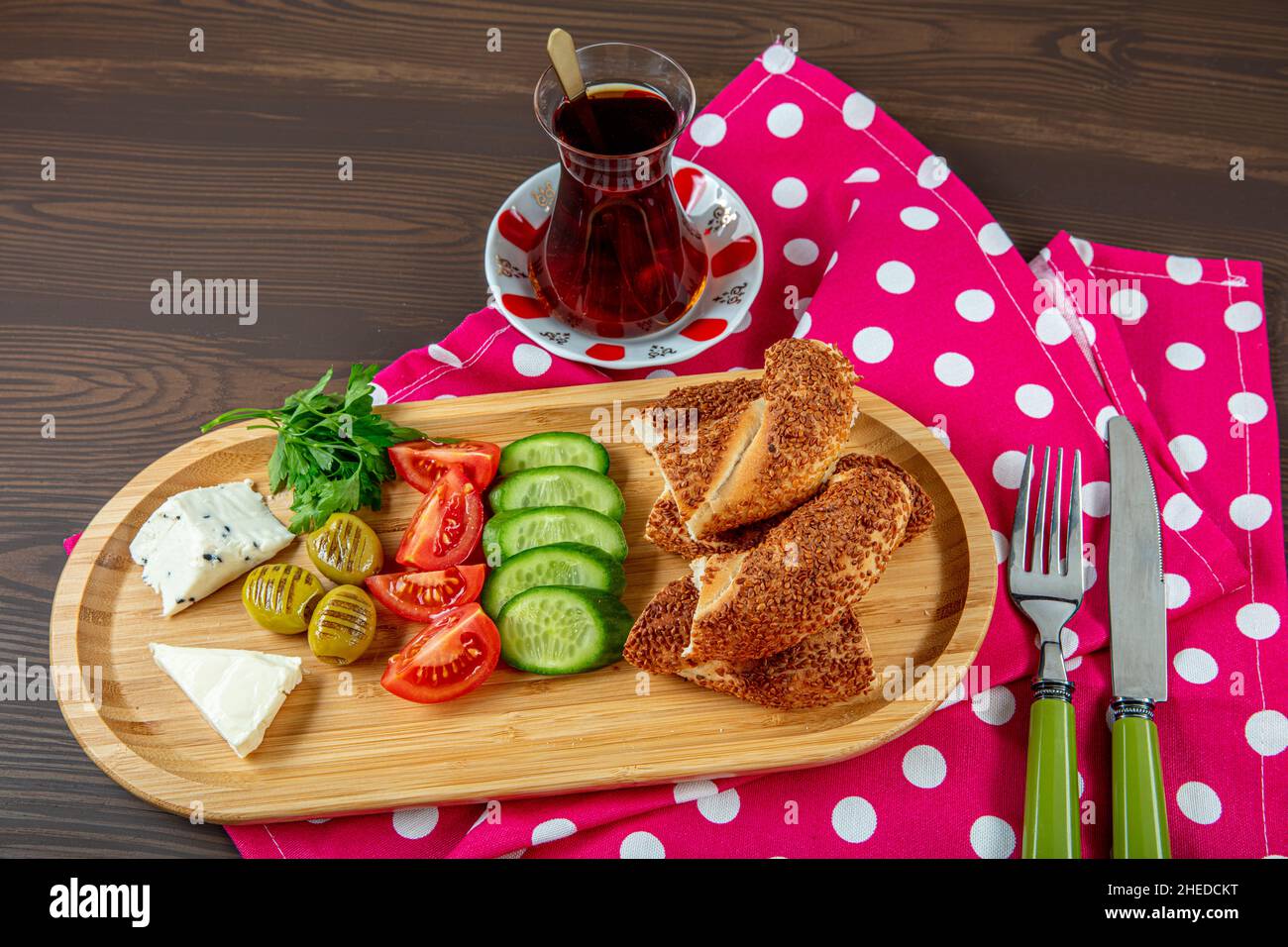 Turkish breakfast with simit, cheese, cherry tomato, cucumber, black ...