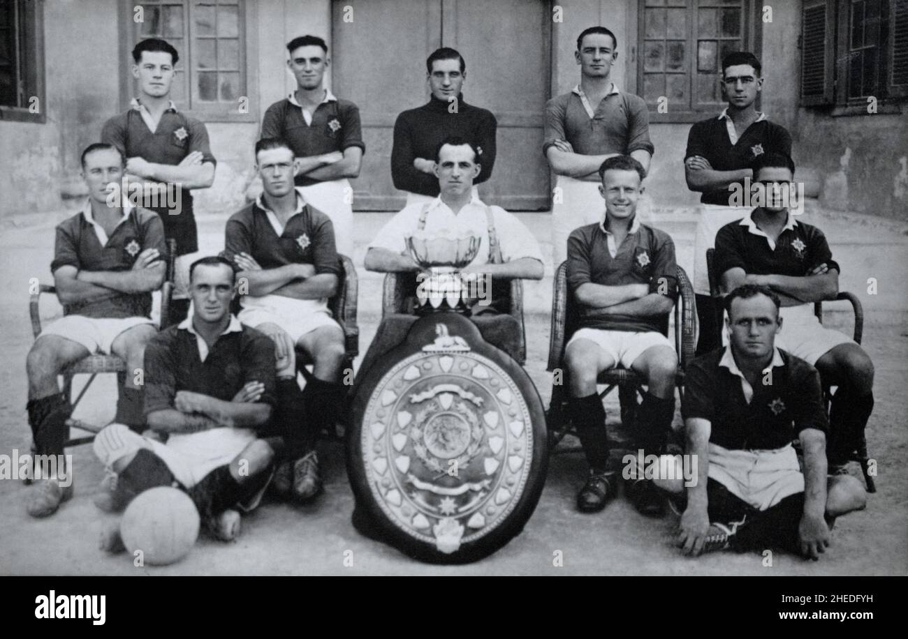 A historical group portrait of a winning Coldstream Guards football ...