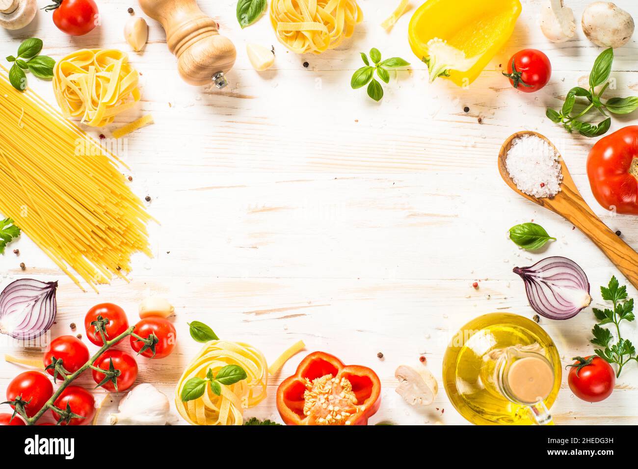 Italian food background at white bkitchen table Stock Photo - Alamy