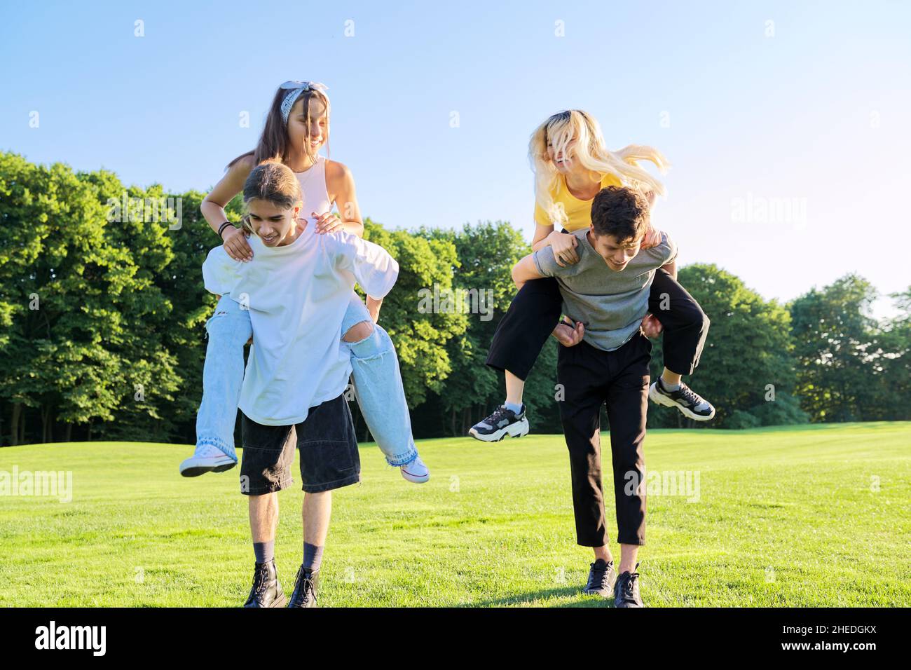 Teenage youth having fun in the park, happy laughing friends Stock ...