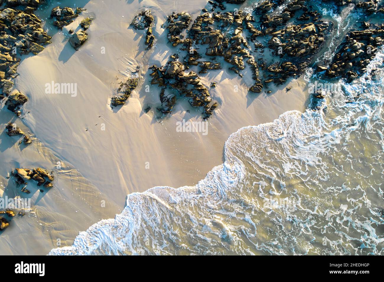 Aerial view of beach with many rocks. Top view Stock Photo - Alamy