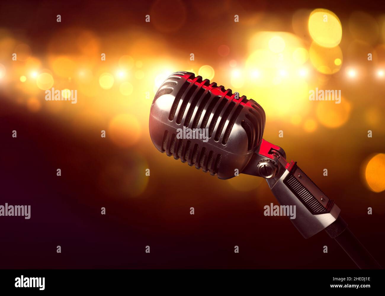 Microphone on stage Stock Photo - Alamy