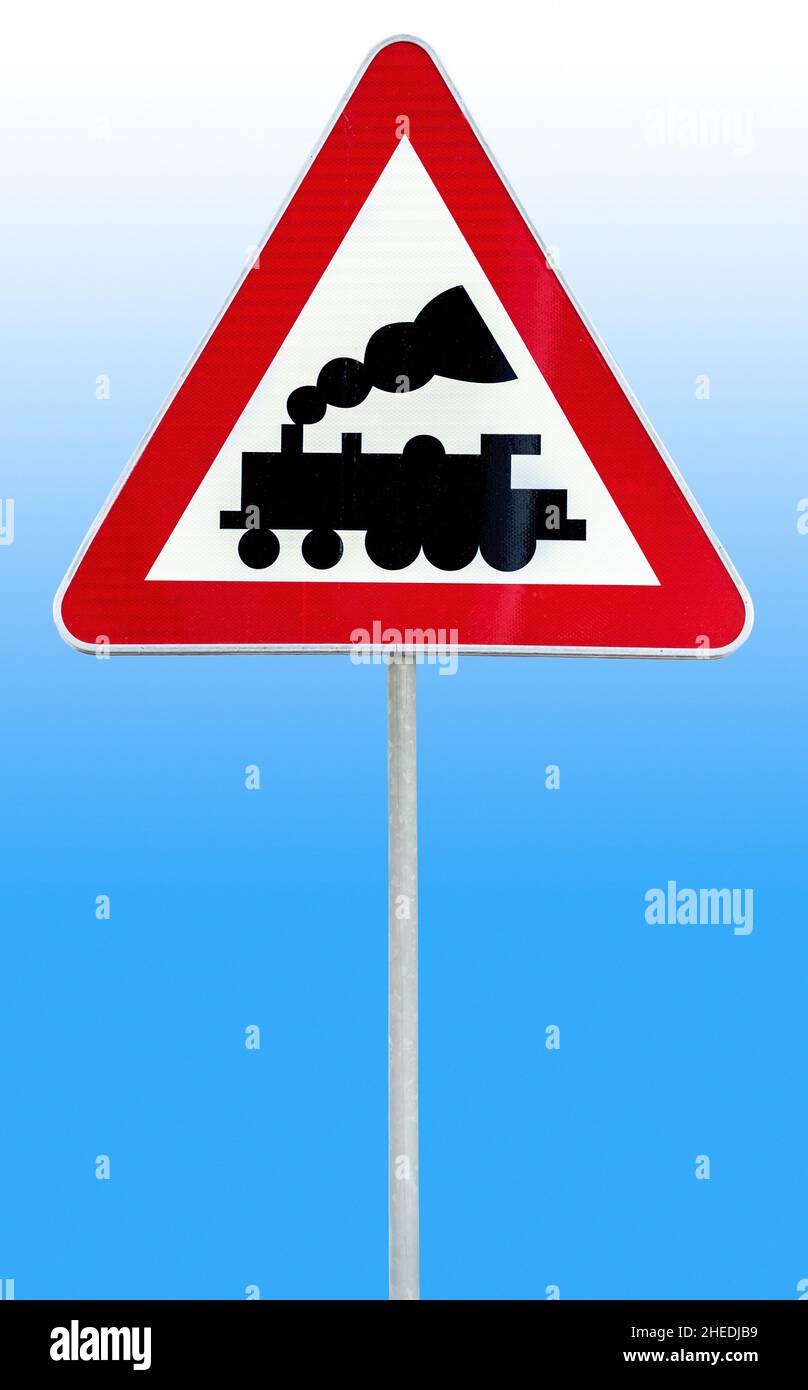 Railroad Level Crossing Sign without barrier or gate ahead the road ...