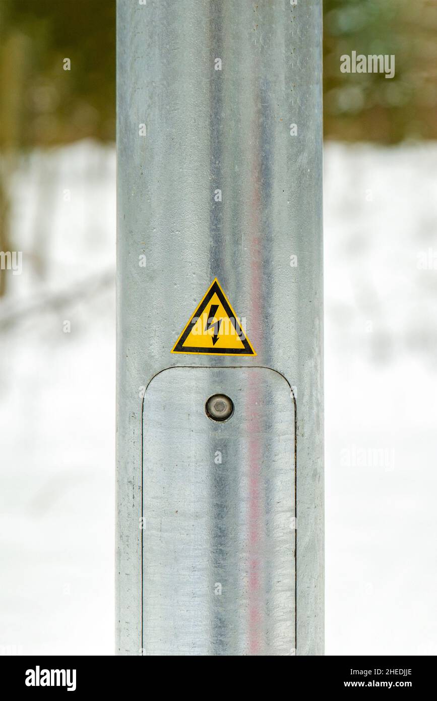 High voltage triangle warning sign hi-res stock photography and images ...